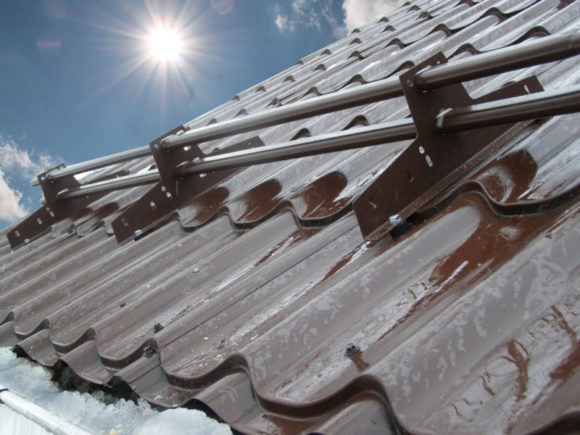 Home-made roof snow retainers: roof-mounted snow protection device and ...